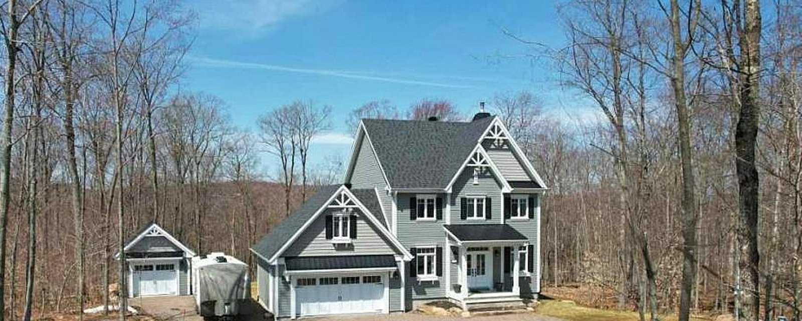 Sublime construction au cœur de la nature dans les Laurentides - Les Maisons