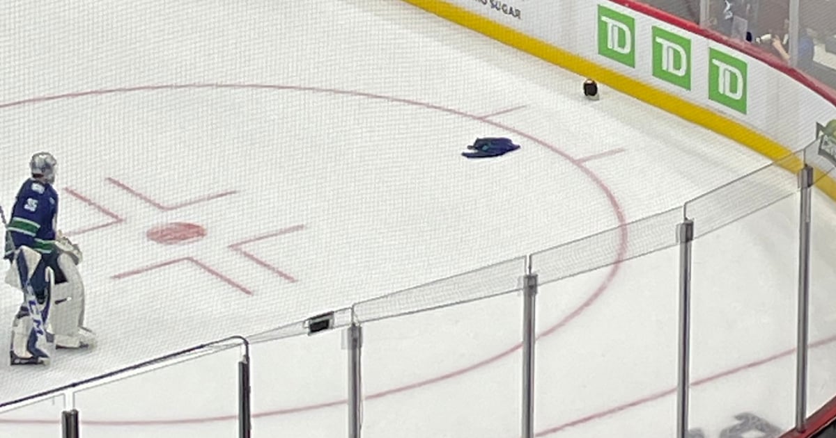 Multiple jerseys thrown on the ice in Canucks home opener. - HockeyFeed