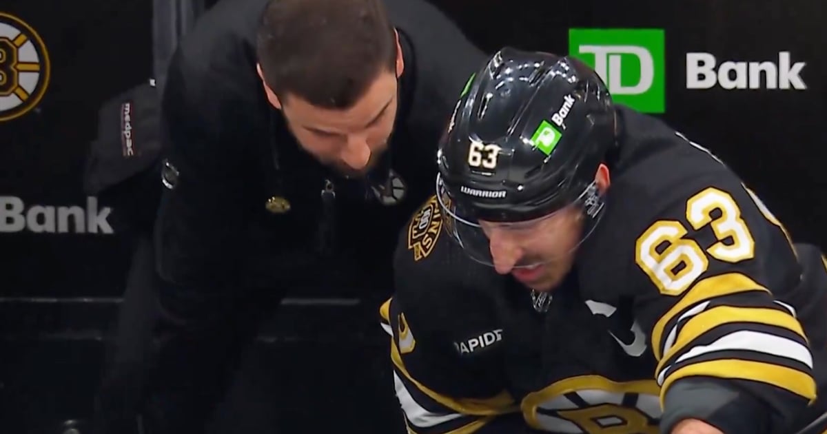 Brad Marchand visibly in pain on Bruins’ bench after brutal collision ...