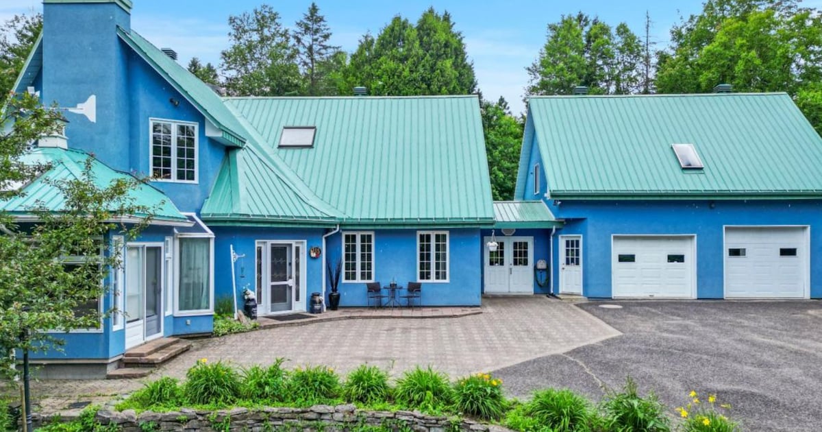 Maison colorée au coeur d'un domaine privé de 140 arpents - Les Maisons